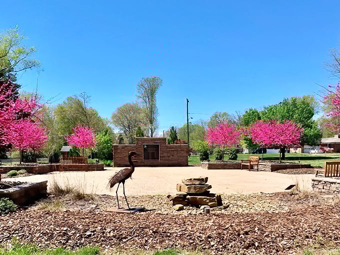 Spring blooms frame this peaceful Eden park, where nature's beauty costs nothing but offers everything to budget-conscious retirees.