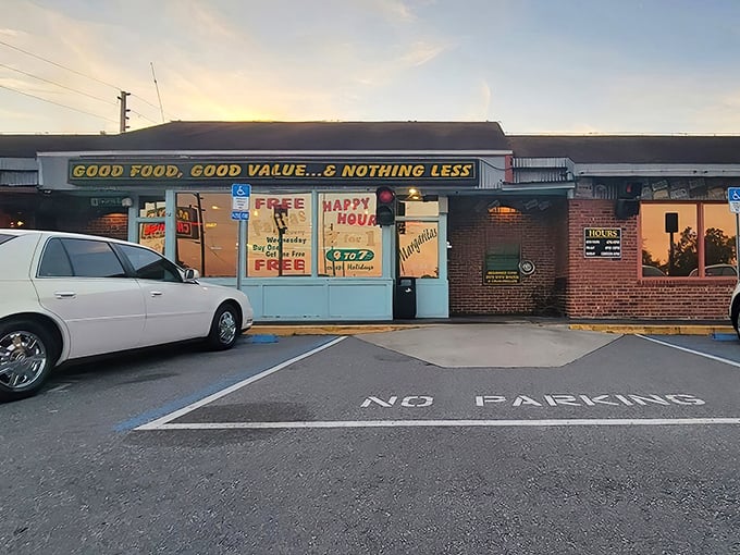 Sunset at Manny's – where happy hour meets happy stomachs. That neon glow is like a beacon for steak lovers.