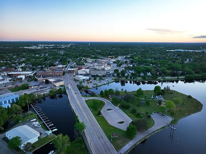 Aerial view of Marinette where the Wisconsin River meets affordable living – proof that waterfront property doesn't always require a tech mogul's salary.