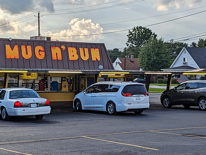 Classic cars and comfort food converge where the parking lot becomes a time machine with tray service.