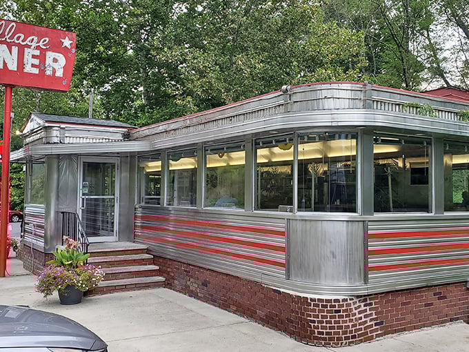 This time-capsule of Americana serves up nostalgia with a side of crispy home fries. The red stripes aren't just decoration—they're a beacon for hungry travelers.