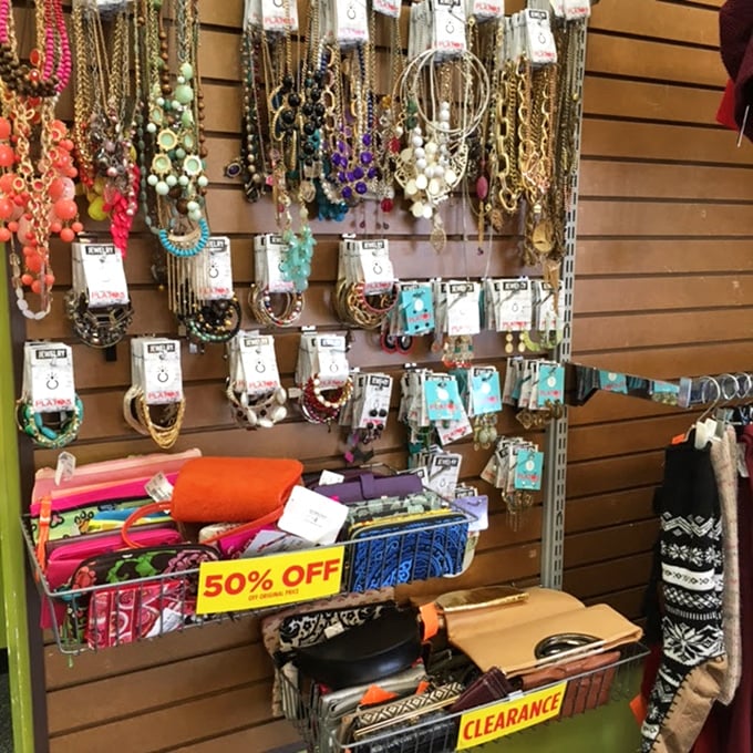 Jewelry paradise or accessory heaven? This wall of colorful necklaces and bargain bins proves one person's "last season" is another's "just discovered."