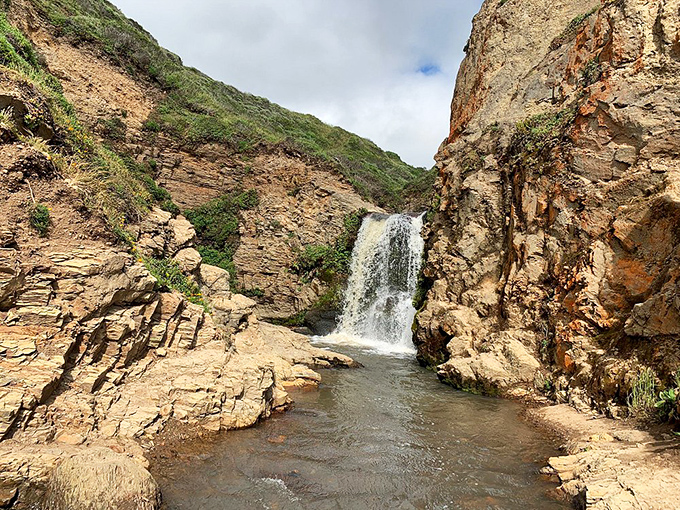 Between these ancient rock walls, water finds its inevitable path. Like life's challenges, the journey through is always worth the effort.