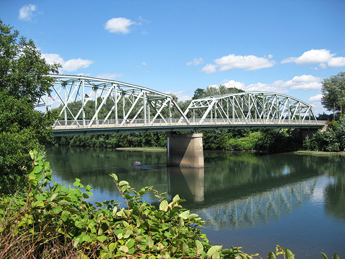 The steel truss bridge spanning the Susquehanna isn't just functional infrastructure—it's a gateway to slower-paced living where retirement dollars stretch like the river below.