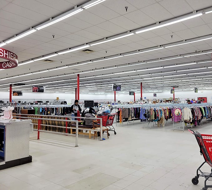 A thrifter's paradise stretches to the horizon—racks upon colorful racks where yesterday's fashion finds tomorrow's admirers at fraction-of-retail prices.