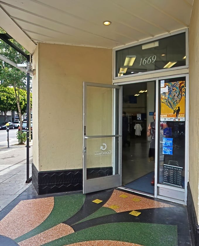 That colorful terrazzo entryway isn't just welcoming you to a store—it's inviting you into a world where every item has a story waiting to be continued.