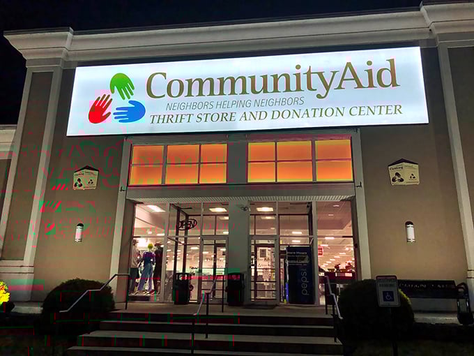 Night or day, this thrift mecca beckons bargain lovers with its illuminated entrance—the gateway to affordable treasures and community support.
