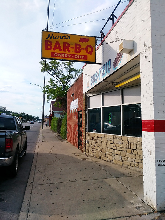 No fancy façade needed when what's cooking inside has people lining up. Nunn's stands proud on the sidewalk, a testament to substance over style.
