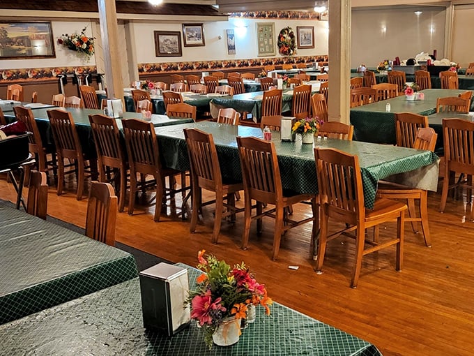 Family-style dining at its finest. The wooden chairs and green tablecloths create the perfect backdrop for memory-making meals that taste like childhood.