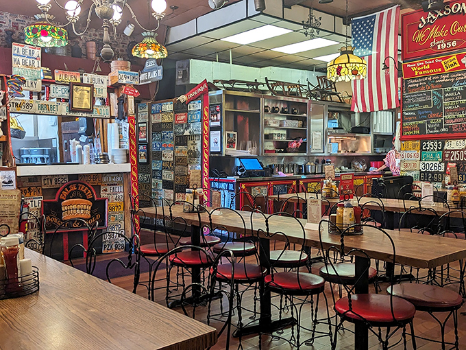 Inside Jaxson's, license plates aren't just wall decorations—they're a roadmap of visitors who've made the pilgrimage to this ice cream sanctuary.