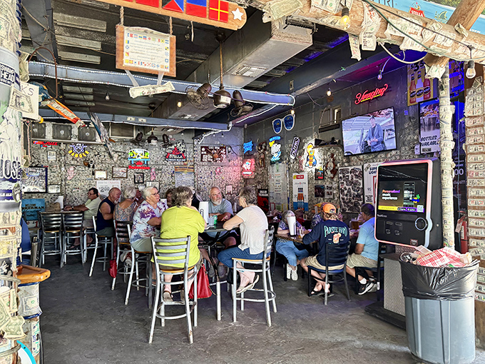 Inside, dollar bills paper the walls like a financial wallpaper museum, creating the perfect backdrop for seafood that's worth every penny. 