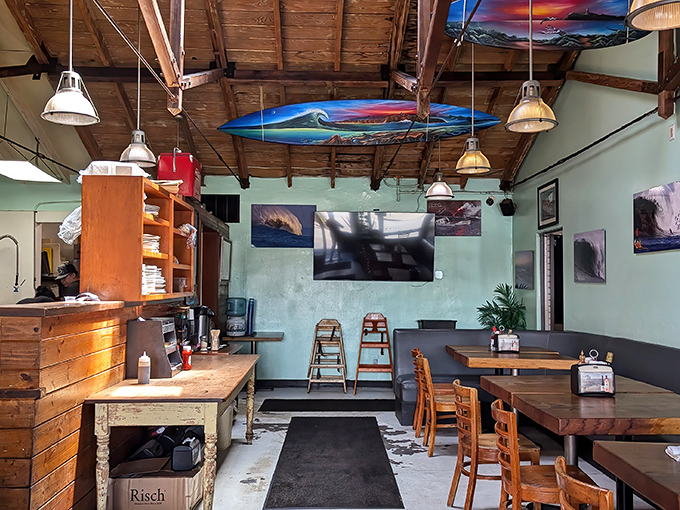 Surfboards suspended from wooden rafters tell you everything – this isn't just a restaurant, it's a shrine to California's wave-riding soul.