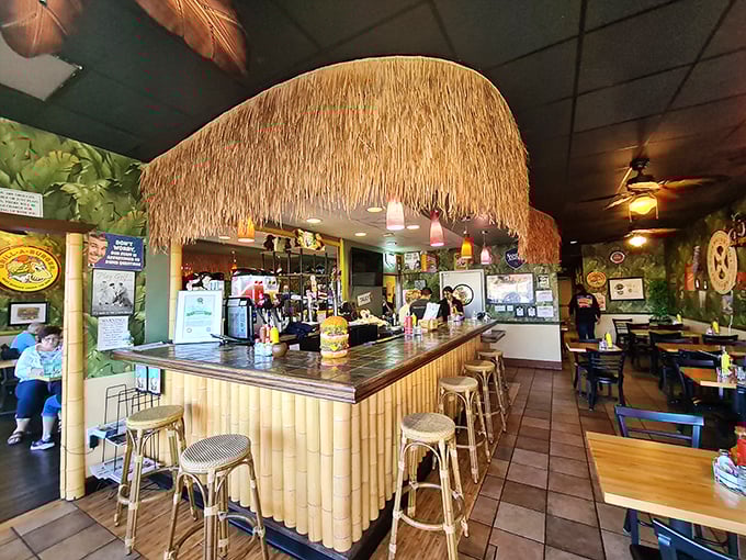 Step inside and suddenly you're in a tropical getaway. That thatched tiki bar isn't just decoration – it's a portal to flavor paradise.
