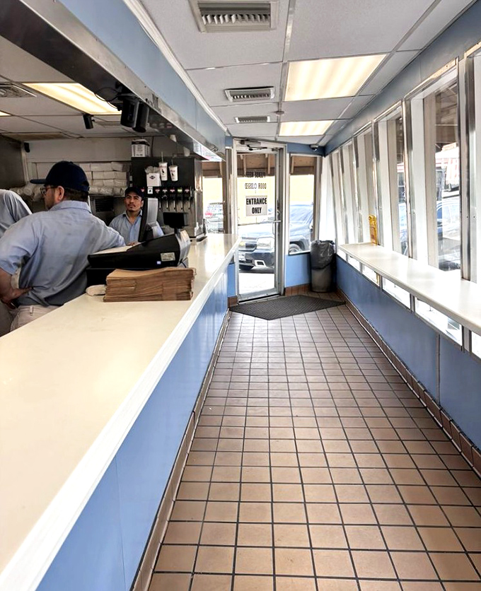 Inside Johnnie's, no-frills is the philosophy. This narrow corridor to sandwich heaven prioritizes efficiency over elbow room—exactly as it should.