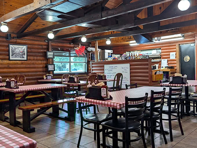 Wooden beams, checkered tablecloths, and the promise of smoky delights—this isn't rustic chic, it's the real deal that designers try to replicate.