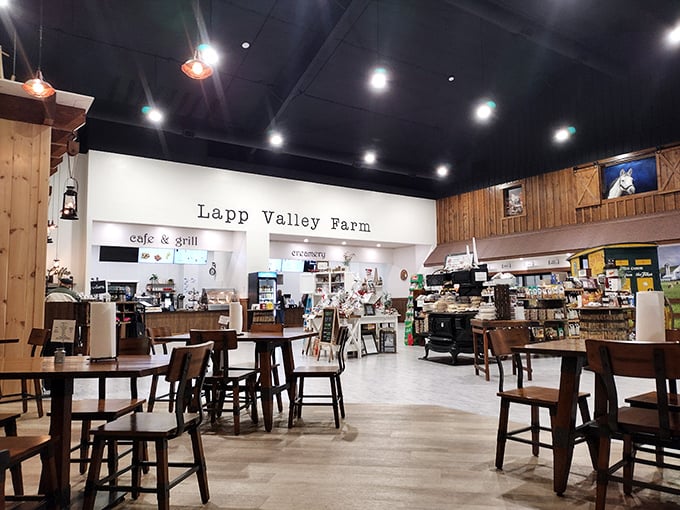 Inside, warm wooden accents and practical furnishings create a cozy, unpretentious atmosphere where time slows down just enough to savor every bite.