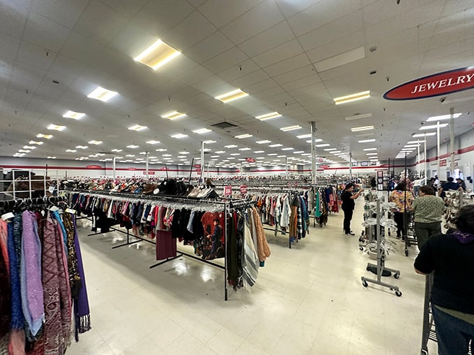 Endless racks stretch toward the horizon in a sea of secondhand possibilities. This isn't shopping—it's an expedition.