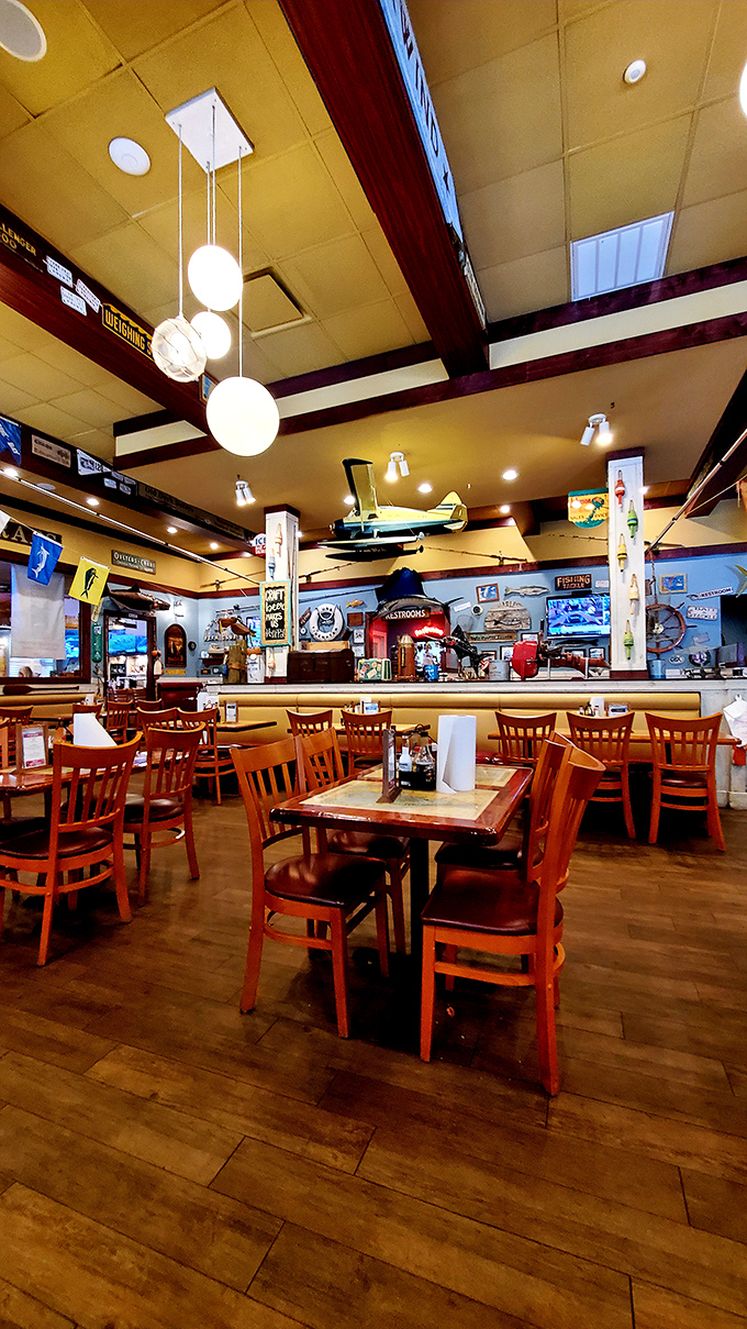 Inside, nautical whimsy meets serious seafood business. That model airplane hanging from the ceiling? Just a hint of the adventures your taste buds are about to embark on.