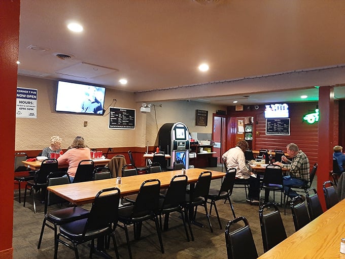 No-frills dining at its finest—red pillars, simple tables, and the quiet hum of conversation create the perfect backdrop for food that needs no fancy setting.