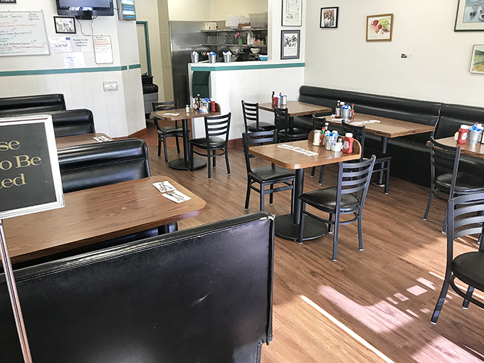 No Edison bulbs or reclaimed wood here—just comfortable booths and simple tables where the spotlight remains firmly on what matters: seriously good food.