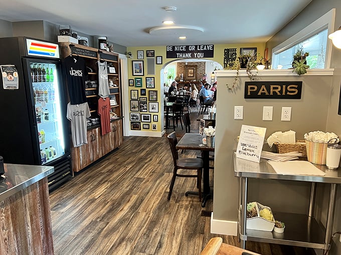 Inside, wooden floors and eclectic decor create a space that's both cozy and Instagram-worthy. The "Be Nice or Leave" sign isn't just decoration—it's a life philosophy.
