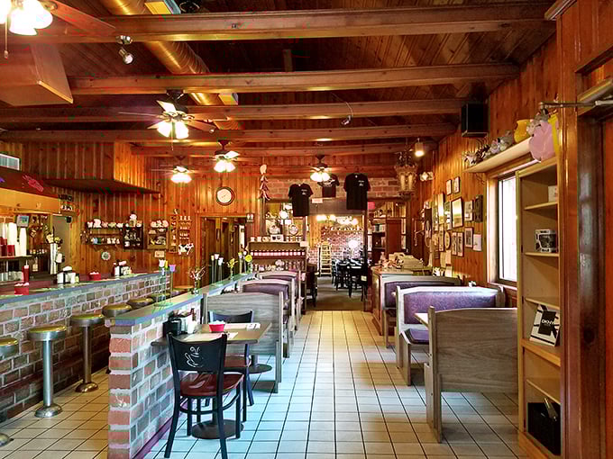 Warm wood paneling and cozy booths create that rare atmosphere where conversations flow as freely as the coffee. Comfort never went out of style here.