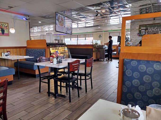 Step inside and you're greeted by that quintessential diner comfort – wooden booths, patterned upholstery, and the promise of hearty meals served without pretension.