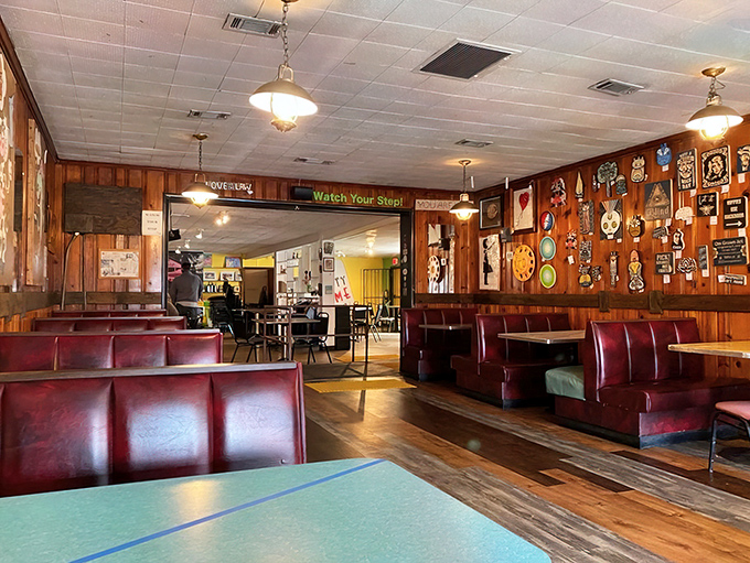 Red vinyl booths, wood-paneled walls, and that "Watch Your Step" sign—stepping into Home grown feels like visiting your coolest aunt's kitchen circa 1975.