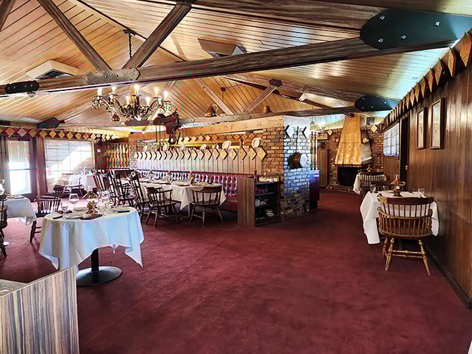 Step inside and time travels backward – wood-paneled ceilings, red carpeting, and Western decor create the perfect backdrop for meat-centric memories.