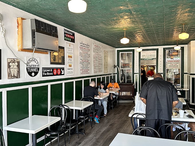 Inside, the narrow dining room with its distinctive green ceiling tiles feels like stepping into a time capsule where sandwiches, not smartphones, command everyone's attention.