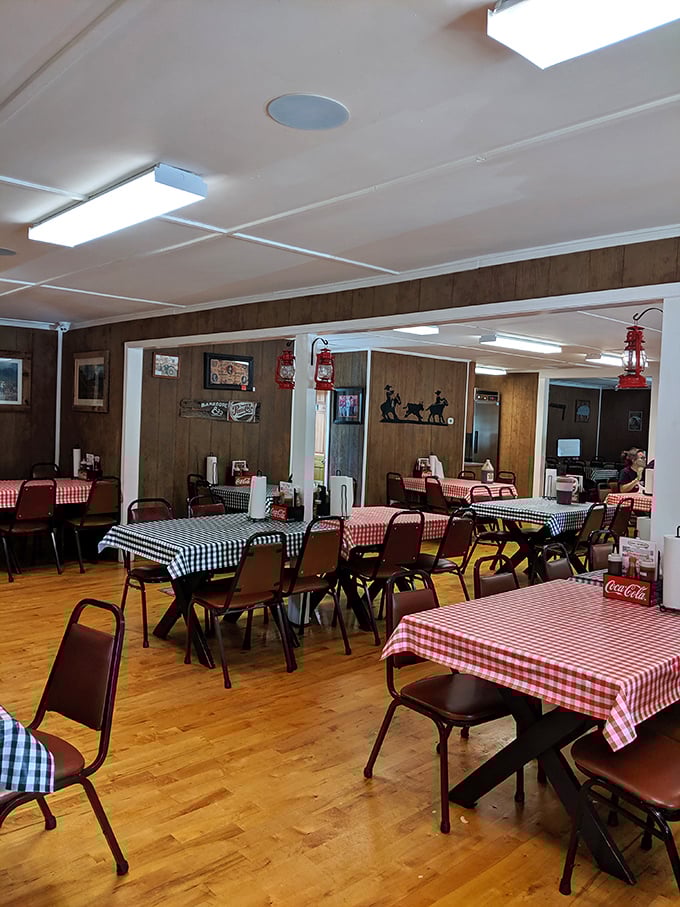Classic red and white checkered tablecloths aren't just decoration—they're a promise that you've found authentic, no-nonsense Southern barbecue worth every mile of the drive.