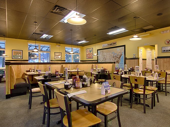 Warm yellow walls and wood accents create that perfect diner atmosphere – not pretentious, just comforting, like breakfast at your favorite aunt's house.
