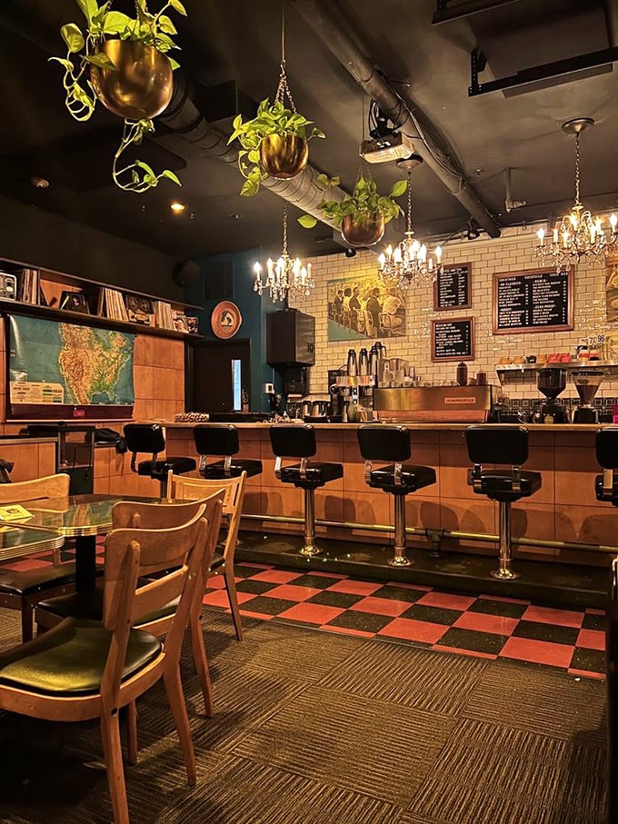 Inside, copper hanging planters and chandeliers meet exposed pipes and vintage maps – like your coolest friend's apartment, if your friend could also make a killer old fashioned.