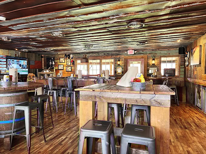 Inside, weathered wood and metal stools create that perfect "discovered gem" atmosphere where memories are made between bites of comfort food classics.