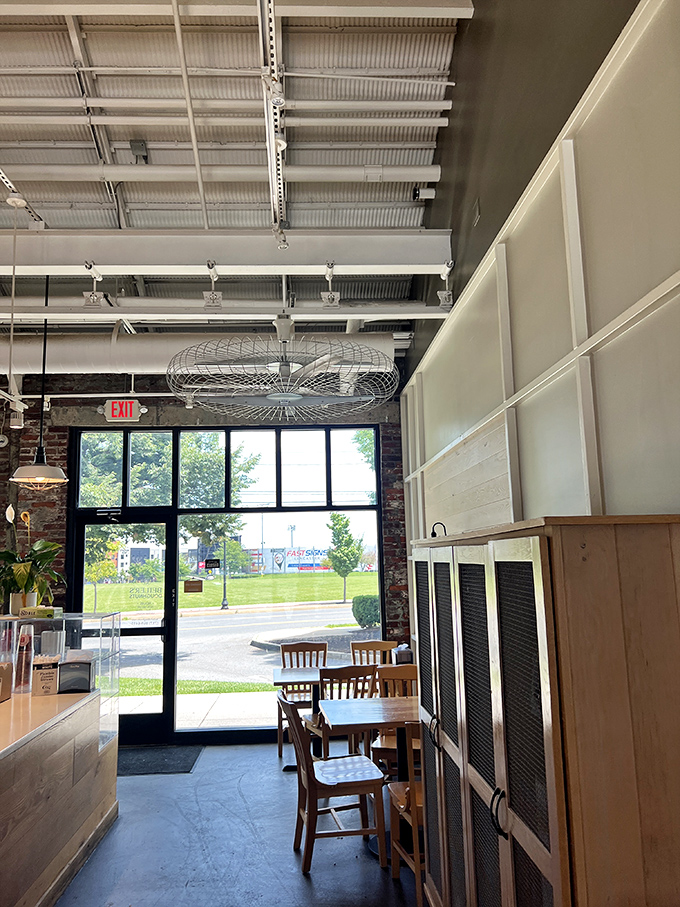 Industrial chic meets donut paradise. High ceilings and natural light create the perfect backdrop for the impending sugar-induced euphoria.