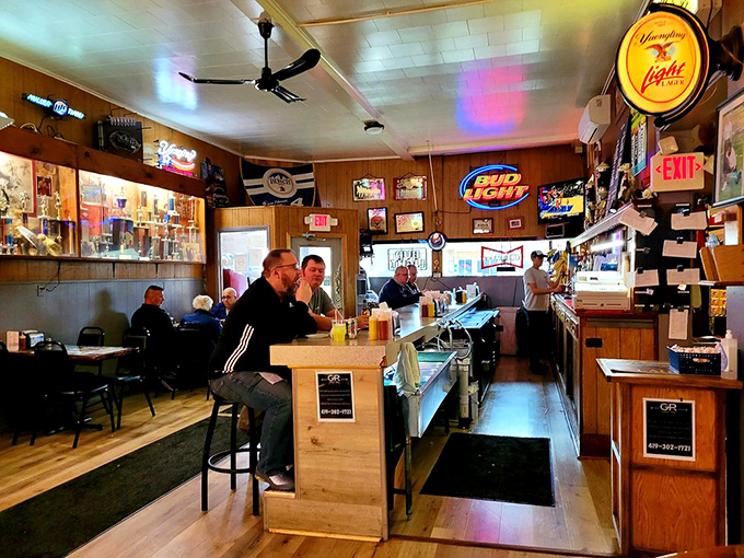 Step inside and you're transported to a classic American tavern where wood paneling, neon signs, and the promise of sandwich perfection await.