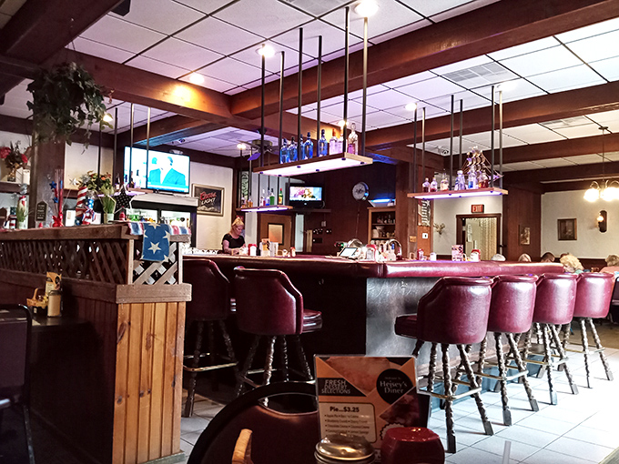 Pull up a burgundy stool at the bar where locals gather to swap stories over coffee. The wood paneling isn't retro-chic—it's authentically unchanged.
