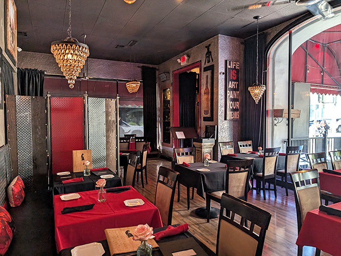 Step inside and Paris materializes in Riverside. Those crystal chandeliers and red tablecloths aren't messing around—this is serious French business.
