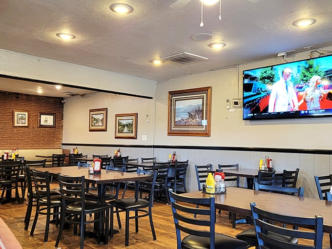 Simple wooden tables, local artwork, and a TV tuned to local news—the perfect recipe for community connection and comfort.