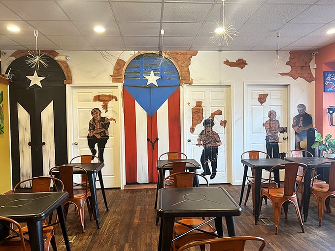 The Puerto Rican flag mural isn't just decoration—it's a promise of authenticity that the kitchen delivers on with every plate.