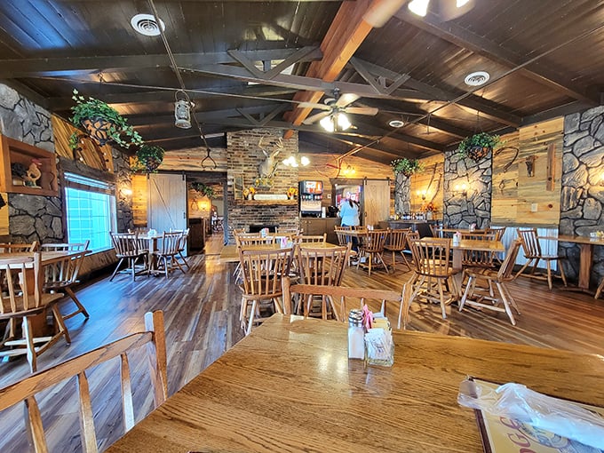 Rustic wooden beams and stone walls create the perfect backdrop for comfort food indulgence. This isn't designer ambiance—it's genuine Tennessee hospitality in architectural form.