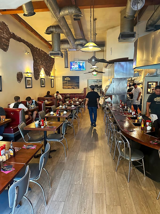 Industrial chic meets comfort food paradise where exposed pipes frame the most important meal of the day. 