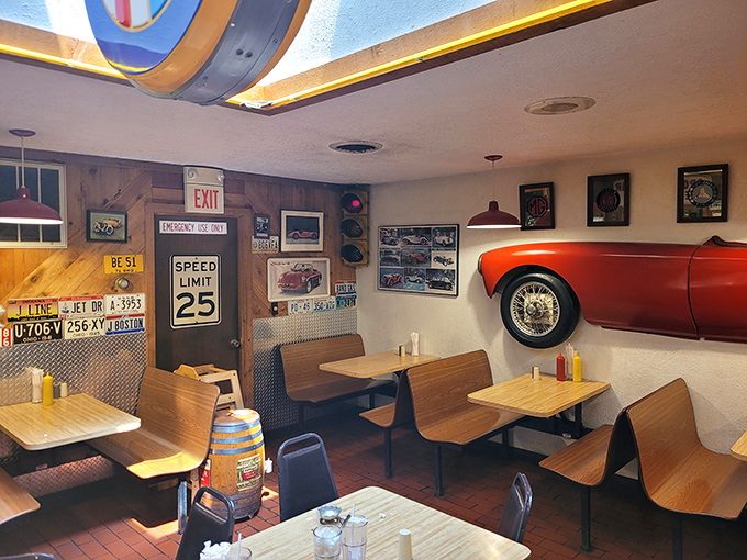 Where classic cars meet classic dining. This isn't retro by design—it's authentic Americana preserved like a time capsule with fries on the side.