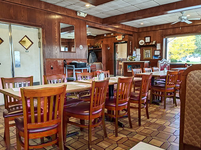 Classic wood paneling and comfortable seating create that quintessential diner atmosphere. It's like stepping into a time machine where comfort food reigns supreme.