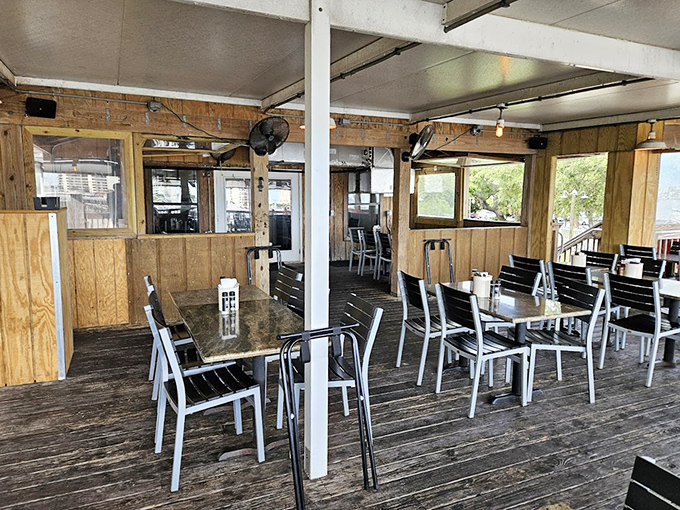Inside, simplicity reigns supreme. No nautical kitsch needed when your dining room already has the best backdrop in town—actual boats on actual water. 