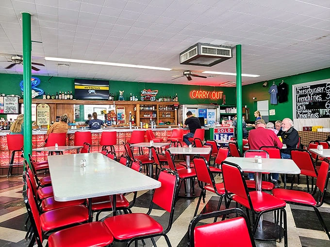 Red chairs and green walls create a diner symphony that's been playing since 1918. No reservations, no pretension, just honest-to-goodness Indiana hospitality.