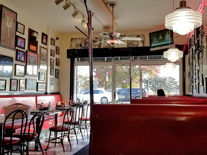 Red vinyl booths, vintage pendant lights, and walls covered in memorabilia – Tommy's interior is the time machine we all secretly crave.