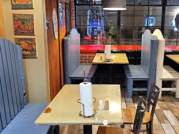 These charming blue dividers between booths aren't just for show—they're privacy panels for when you inevitably make those involuntary "this is so good" noises.