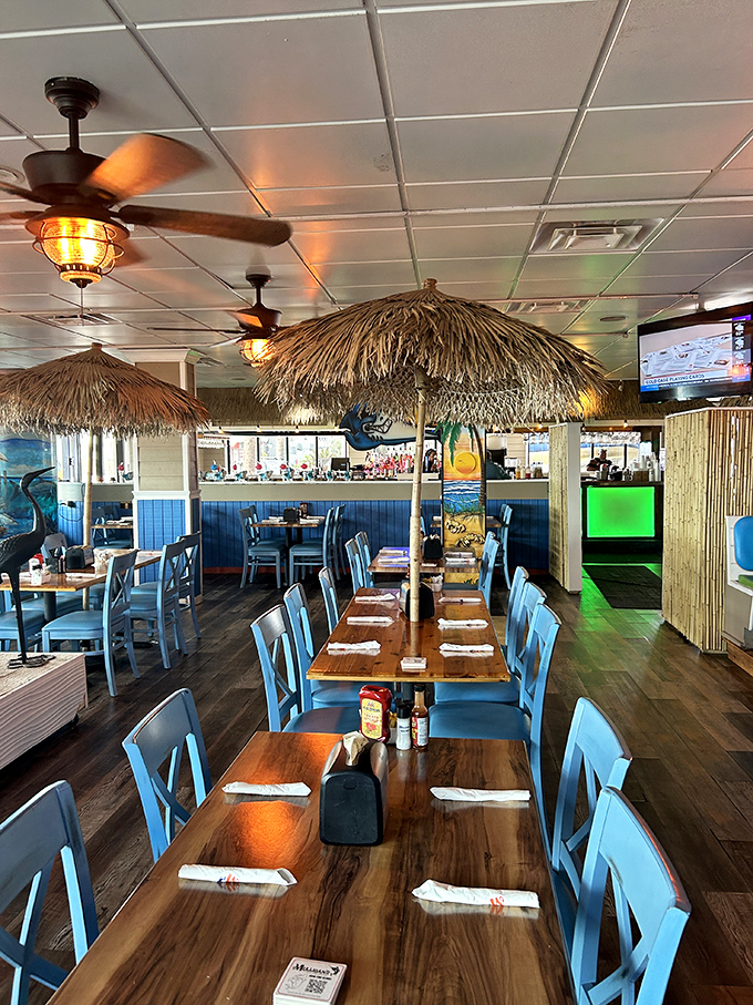 Thatched umbrellas create intimate dining islands throughout the restaurant, transforming an ordinary meal into a mini-vacation for your taste buds.