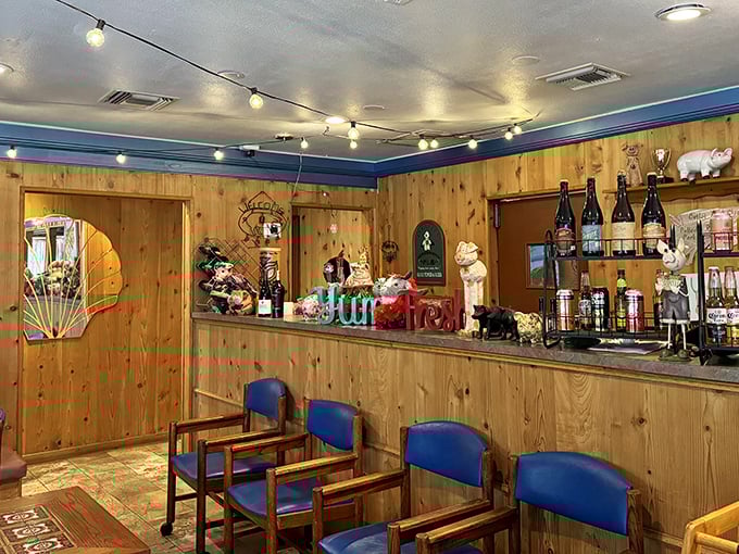 Wood-paneled walls and blue chairs tell you this isn't fancy—it's better. Authentic charm you can't manufacture, only accumulate over decades.